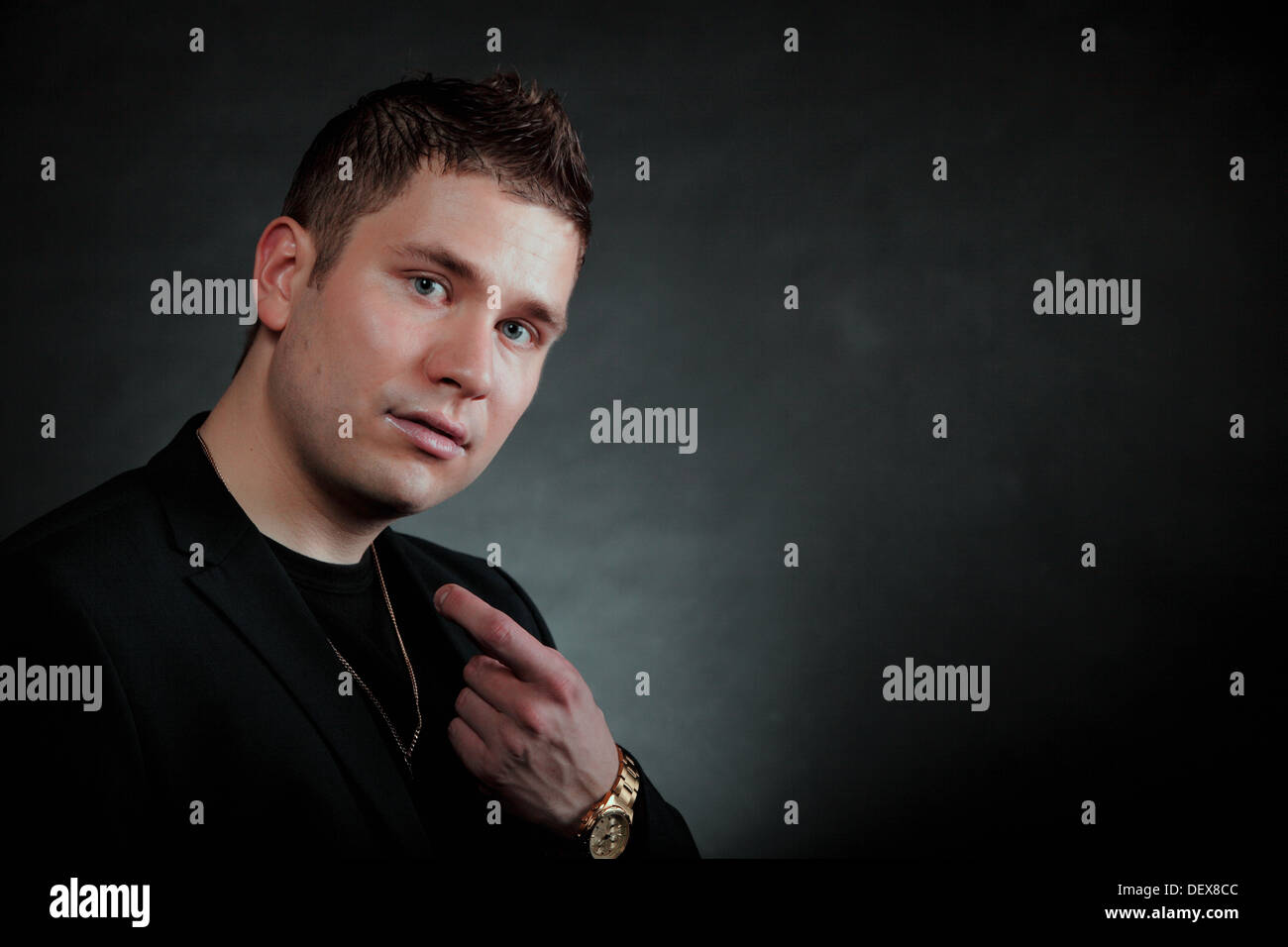 Portrait of pensive man. Close up face on black background Stock Photo ...