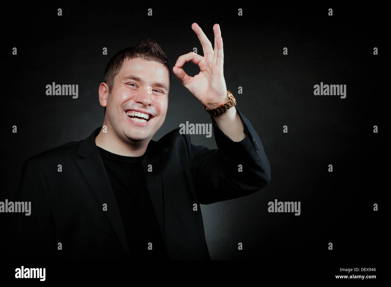 Happy Satisfied man gesturing the all right symbol, showing ok sign ...