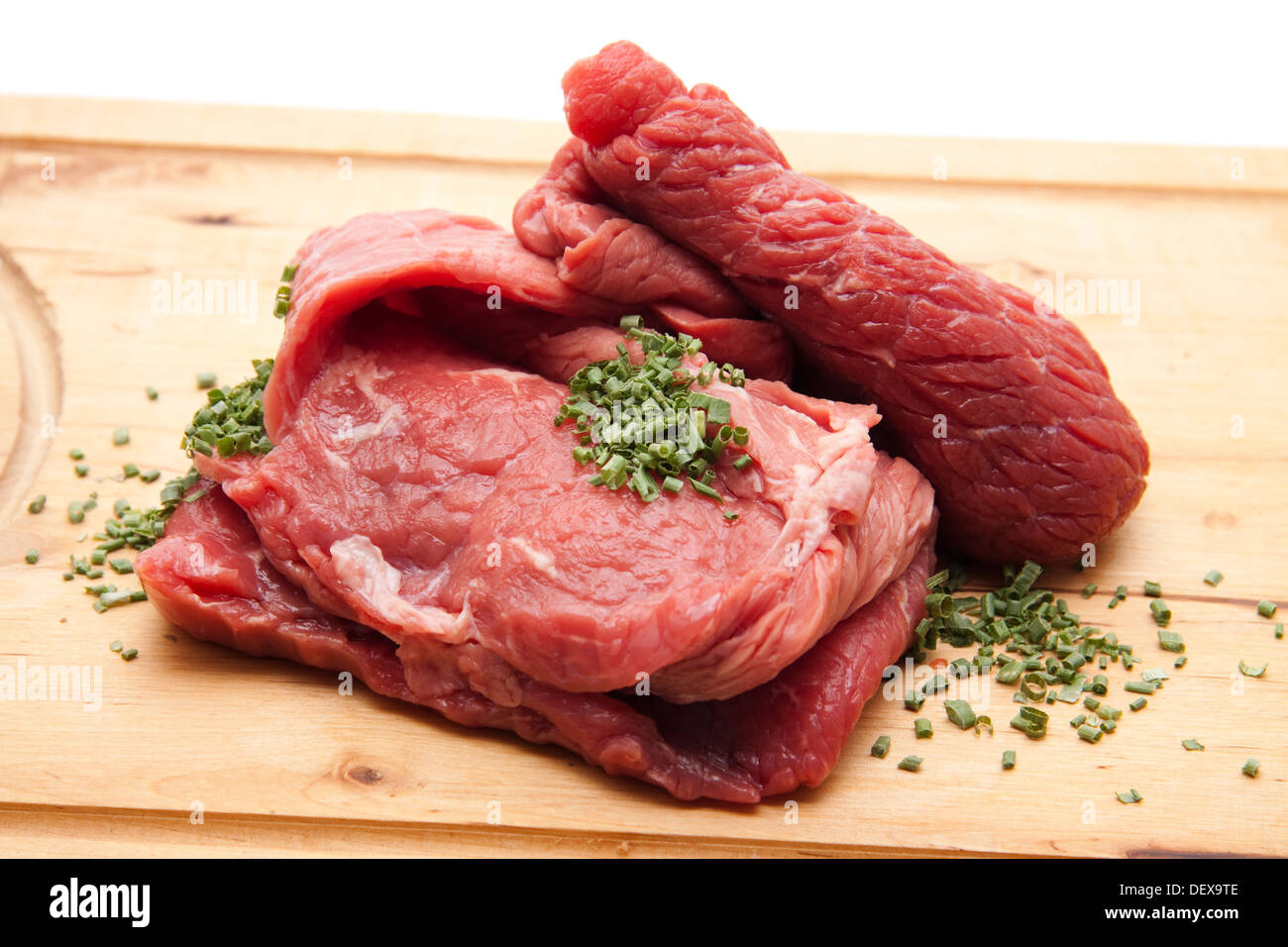 Fresh beef rolls with chives Stock Photo - Alamy