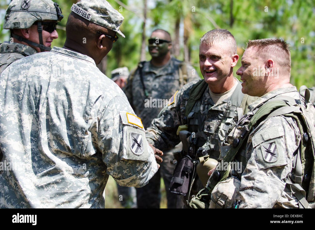 Georgia National Guard Command Sgt. Maj. Phillip Stringfield talks with ...