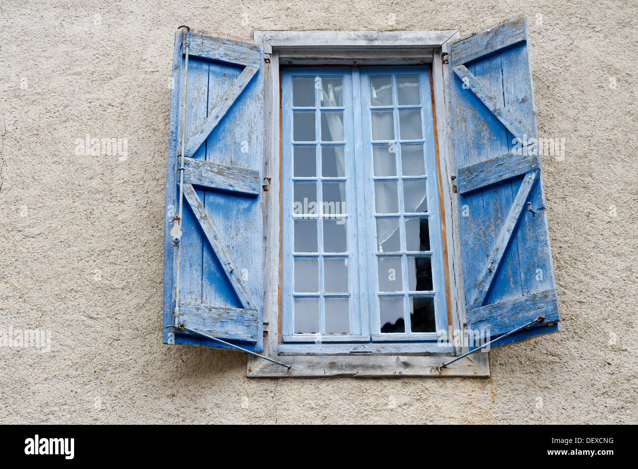 Open French window with blue shutters Stock Photo - Alamy