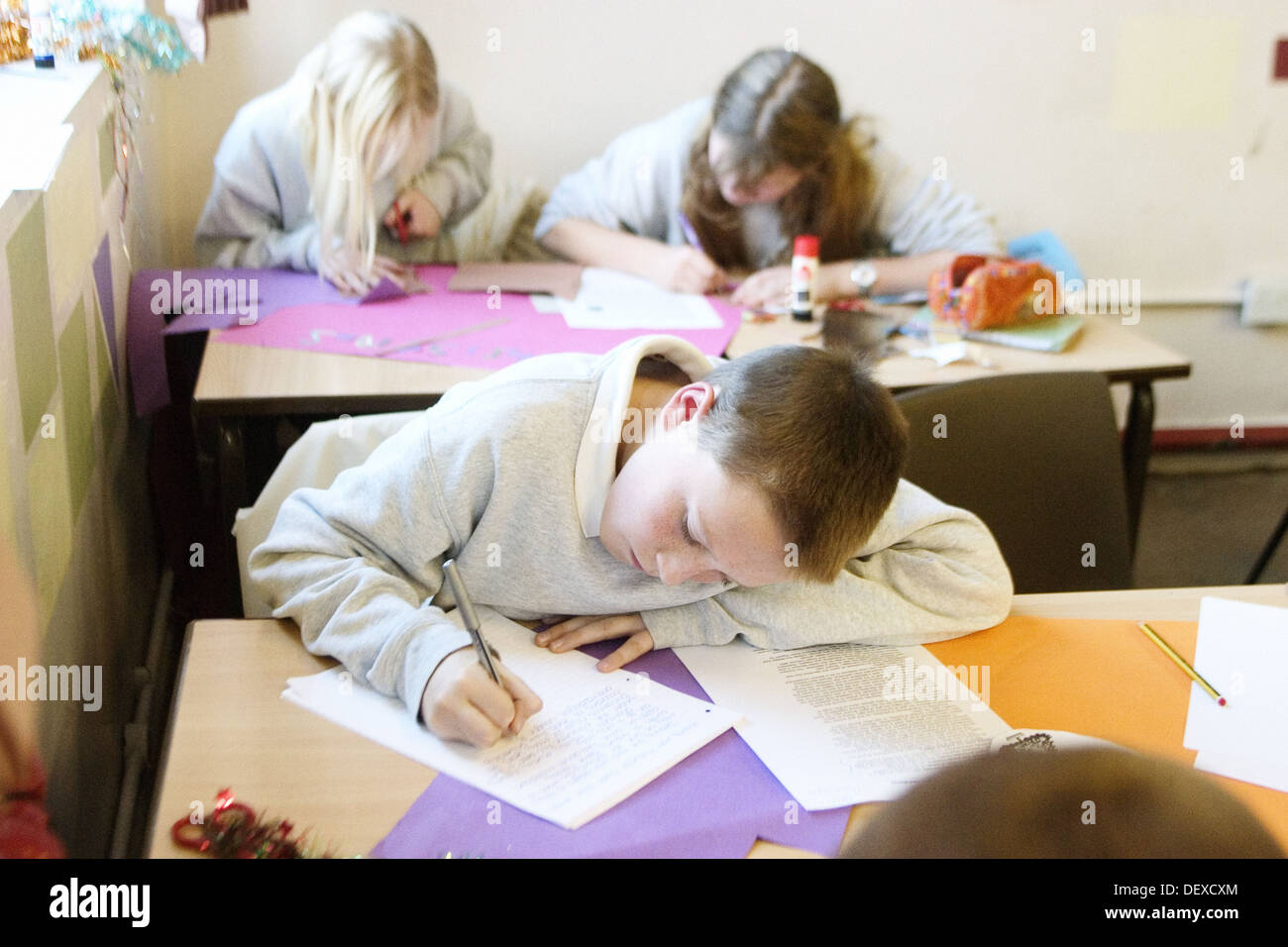 12 year old student writing hi-res stock photography and images - Alamy