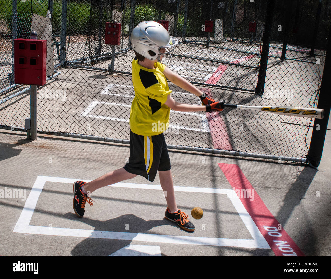 Young boy playing baseball Stock Photo - Alamy