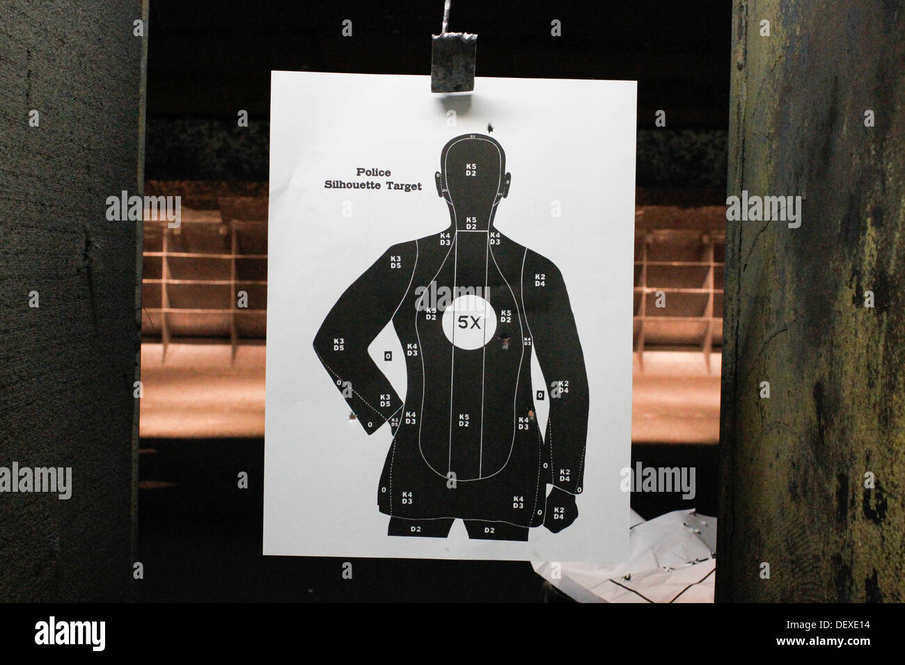 A target pulled up to a booth at an indoor gun range on Apr. 5, 2011 ...