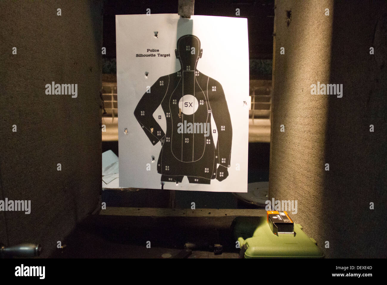 A target pulled up to a booth at an indoor gun range on Apr. 5, 2011 ...