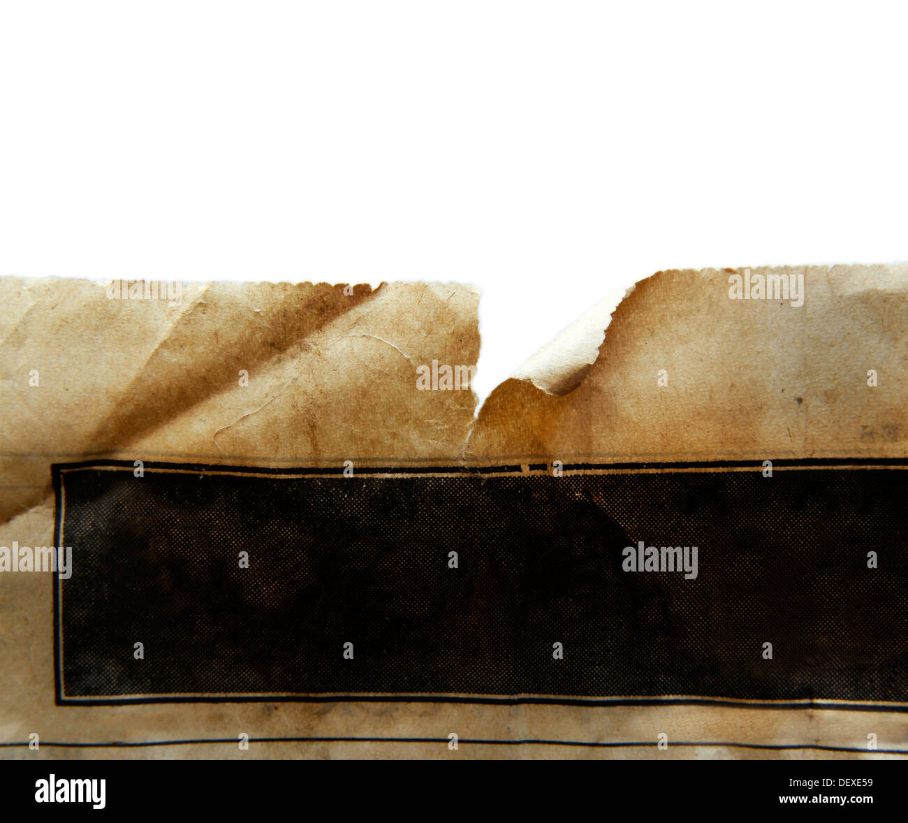 Closeup of old ripped paper on plain background Stock Photo - Alamy