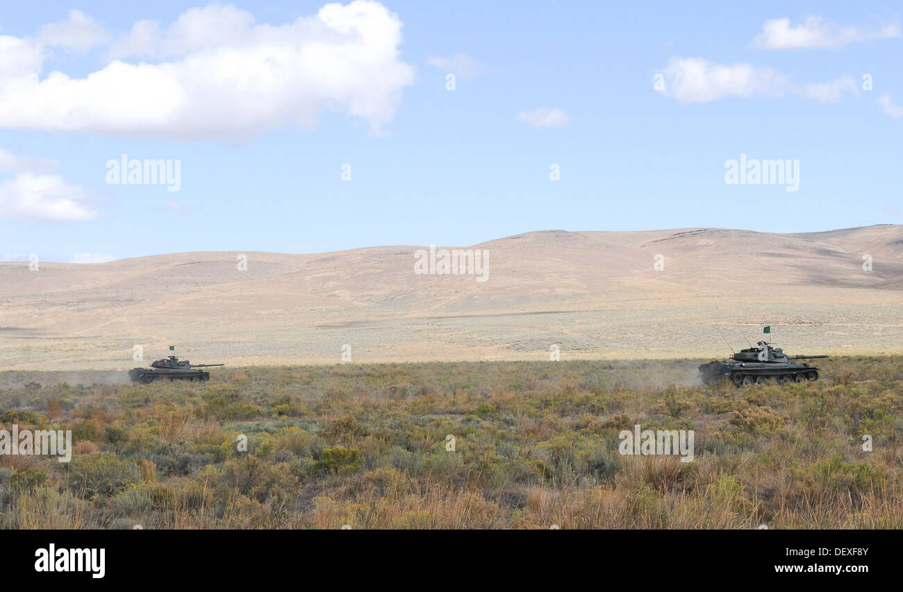 Japanese tanks race across the plains of the Yakima Training Center ...