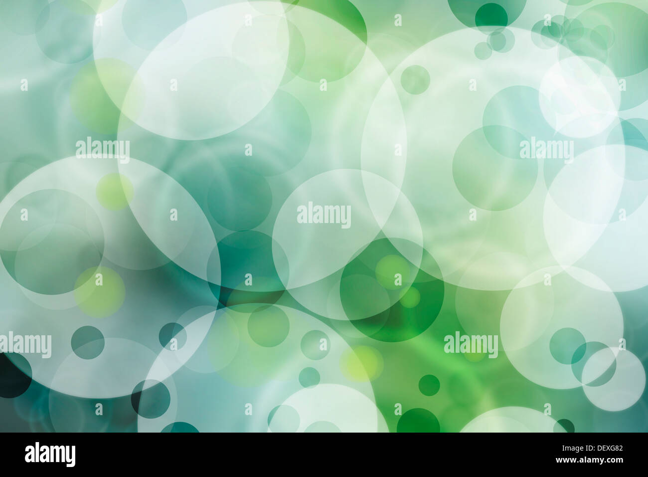 Circles on green tone background Stock Photo - Alamy