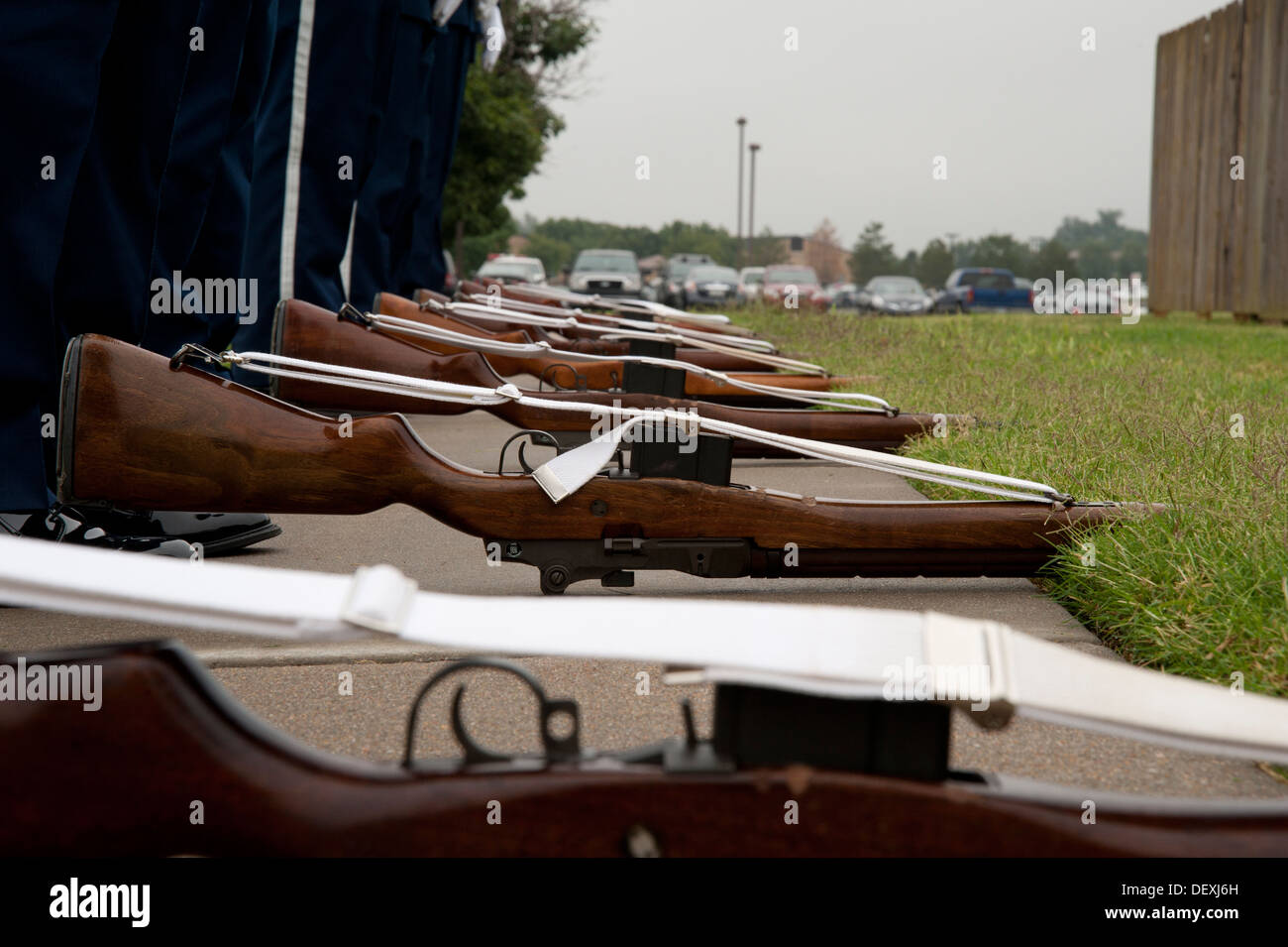 M14 rifles line the ground in front Airmen from the 22nd Air Refueling ...