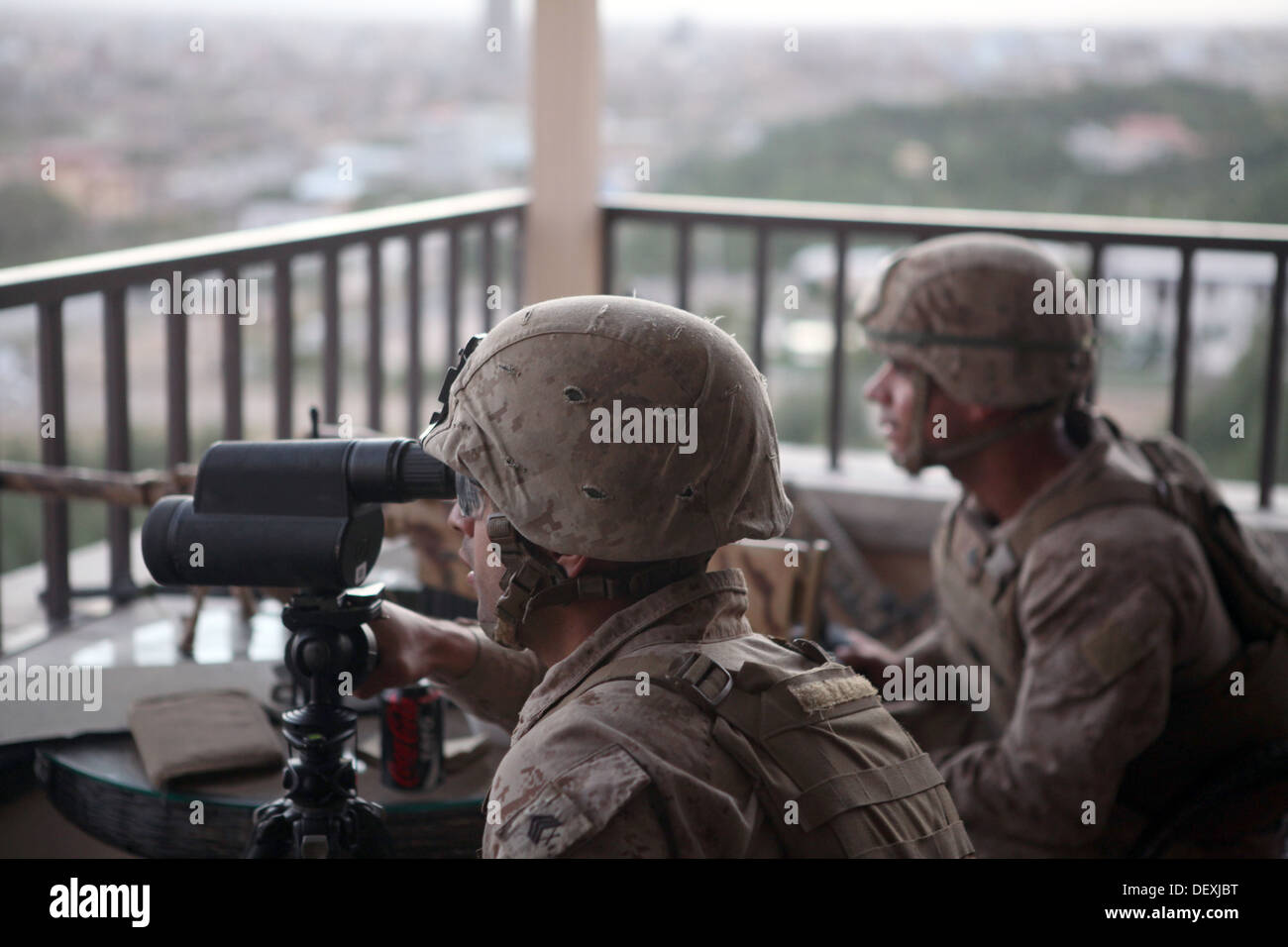 U.S. Marines pull security overwatch on a balcony at the U.S. Consulate ...