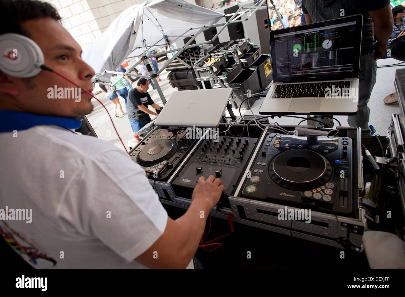 DJ playing music at an outdoor concert - USA Stock Photo - Alamy