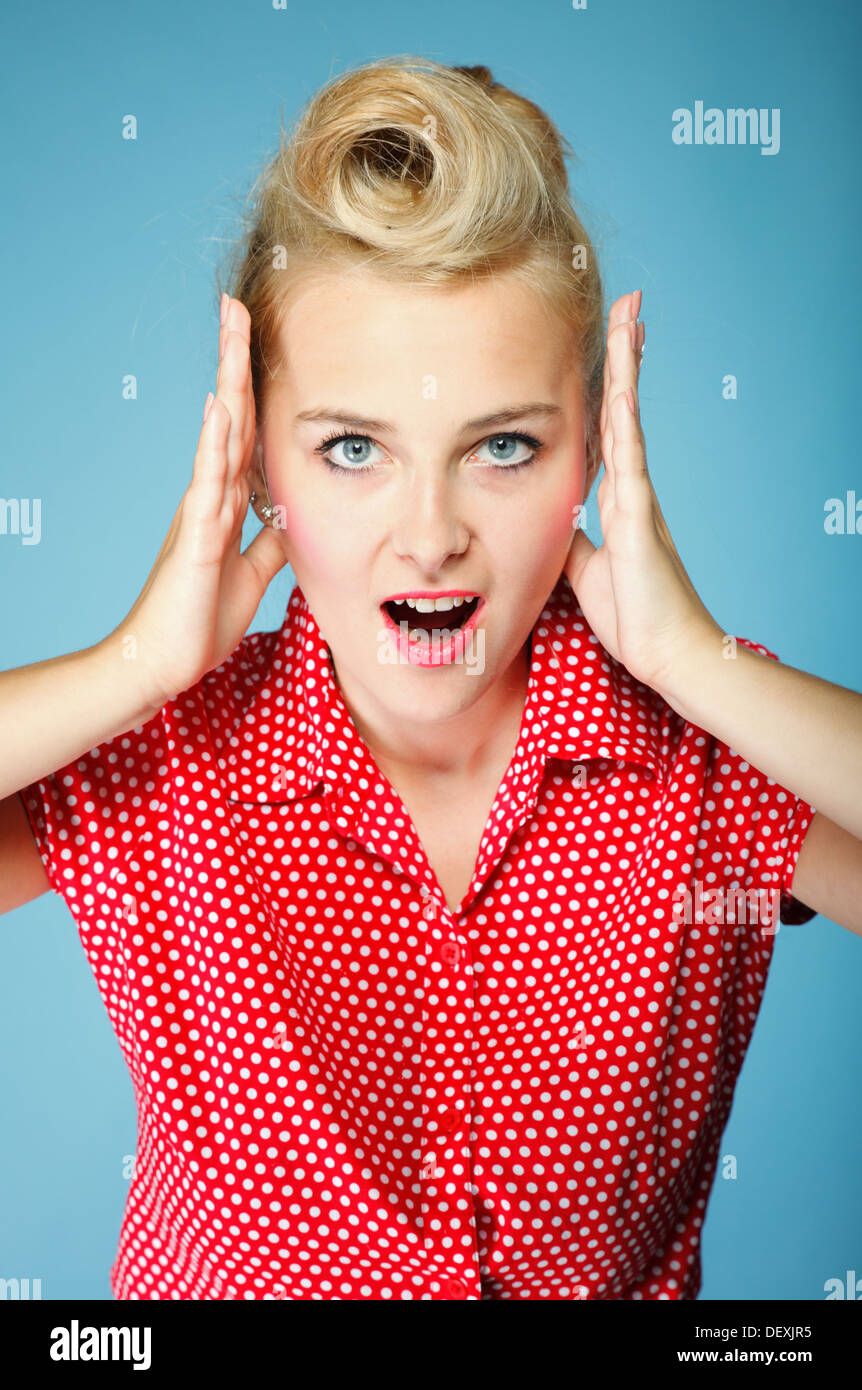 Funny shock pinup girl holding hi-res stock photography and images - Alamy