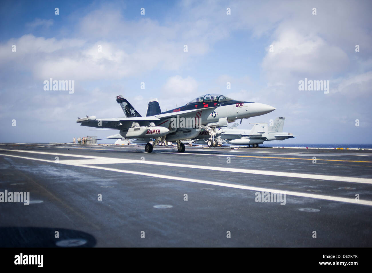 An EA-18G Growler from the Shadowhawks of Electronic Attack Squadron (VAQ) 141 makes an arrested ...