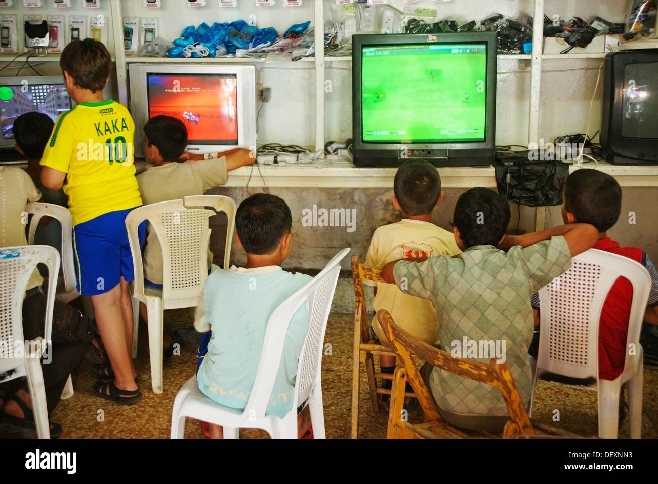 Kids with video games and football on the island of Arwad, Syria Stock ...