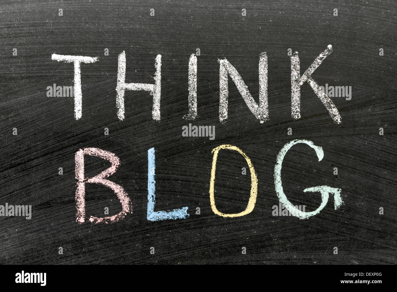 Think blog phrase handwritten on school blackboard Stock Photo - Alamy