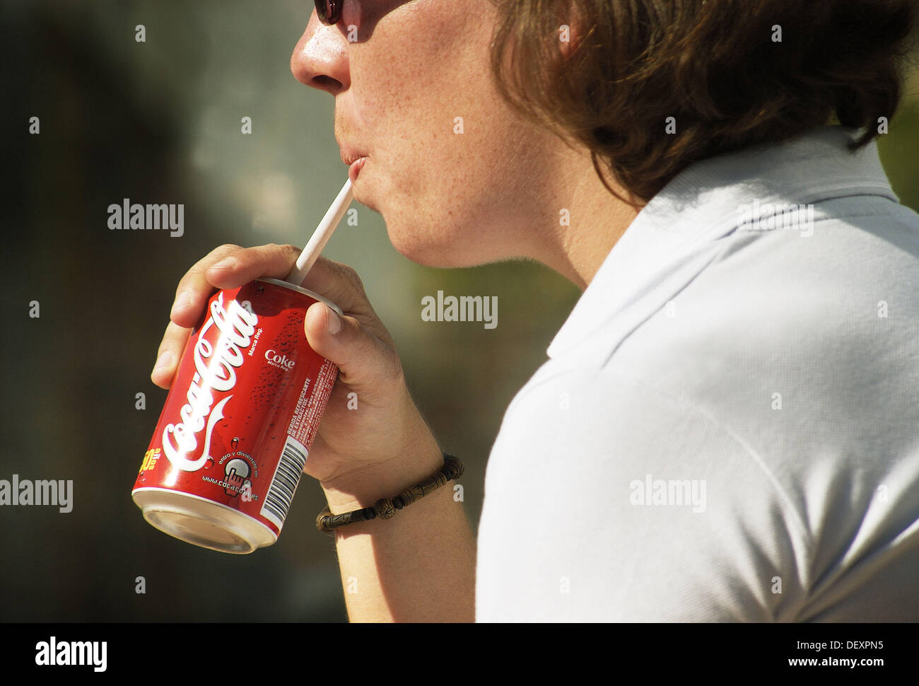 Drinking coca cola girl hi-res stock photography and images - Alamy