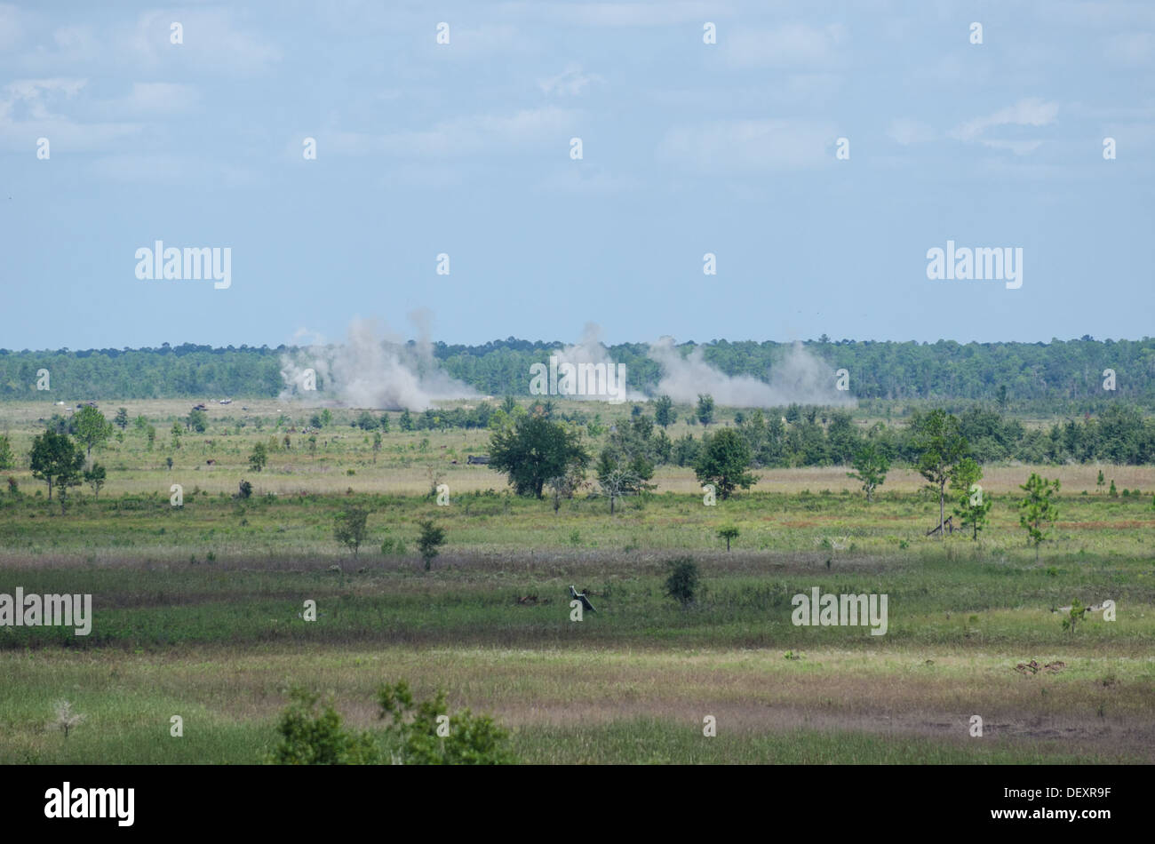 Sixty mm mortars impact out on the range as Apache helicopters prepare ...