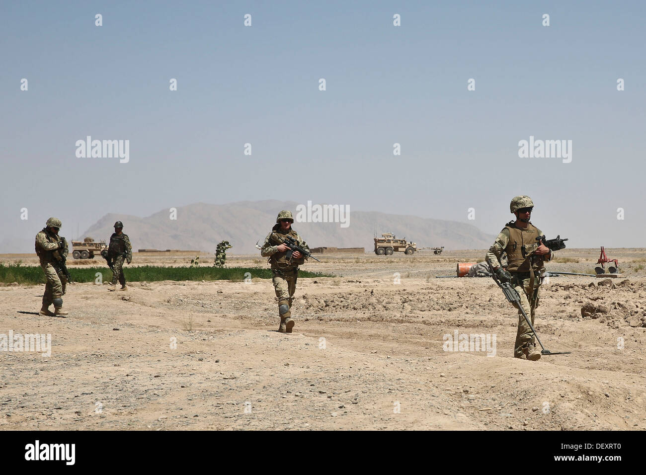 Afghan National Army (ANA) soldiers and Coalition Forces patrol in ...