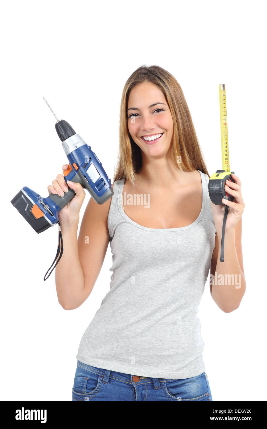 Beautiful woman holding a power drill and a tape measure isolated on a ...