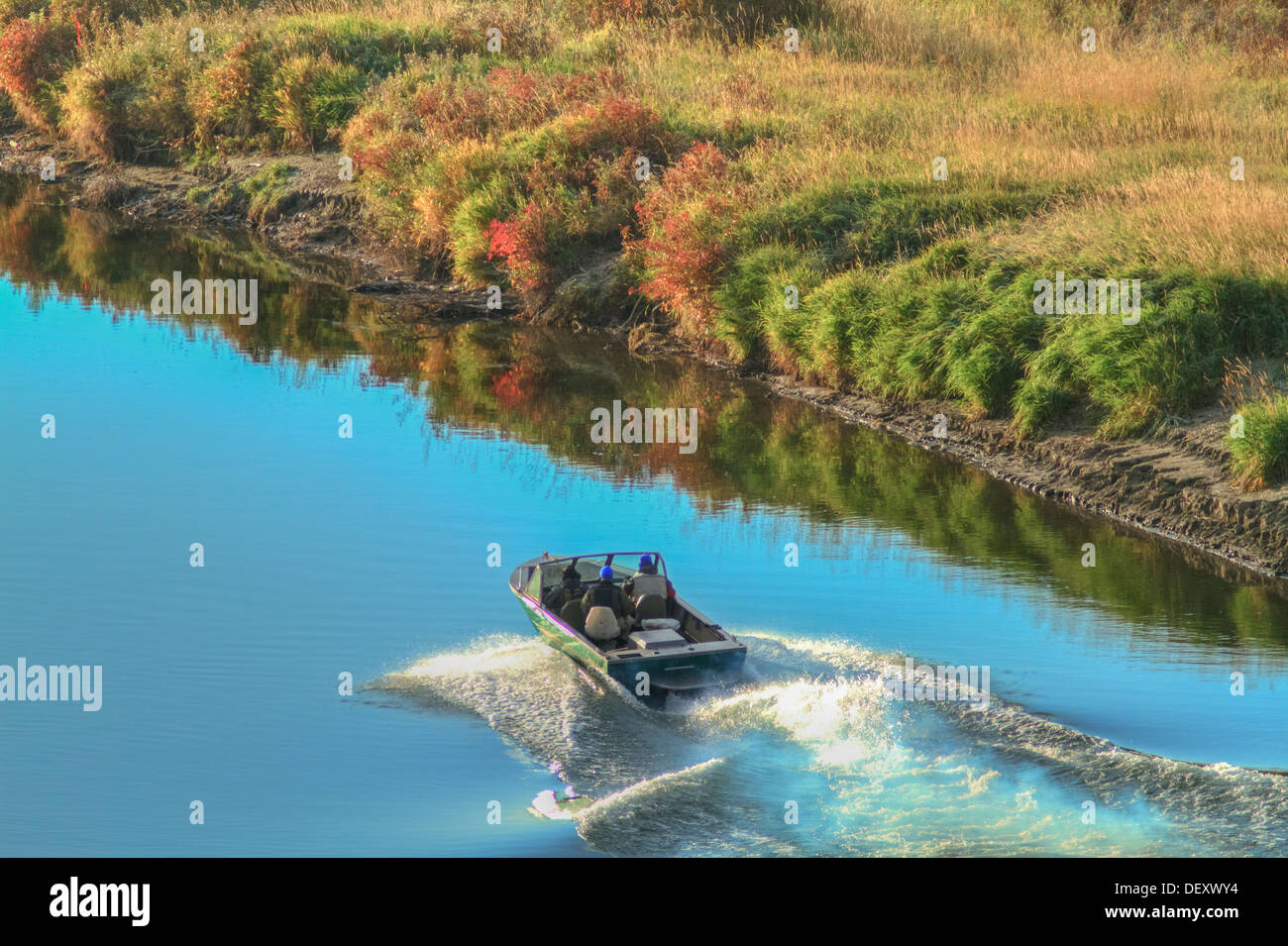 Scenic, colorful, pretty, beautiful autumn setting of fishing boat and ...