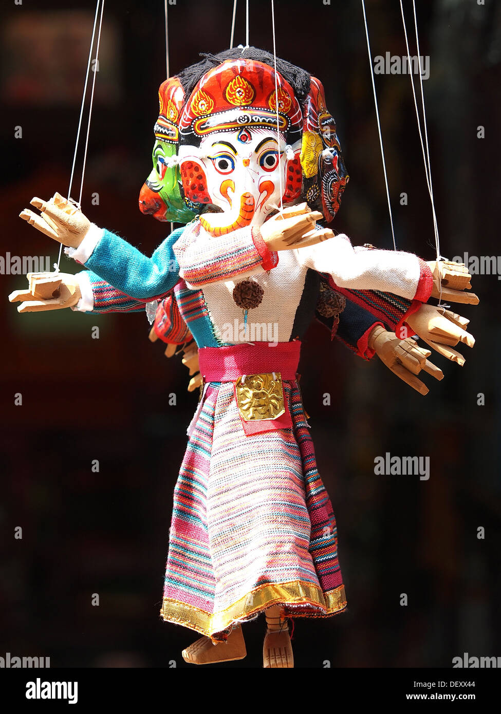 puppet with three different faces Stock Photo - Alamy