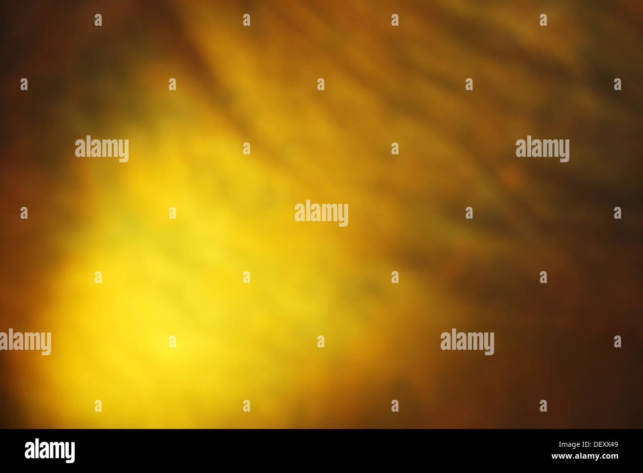 Blurred yellow background with gradient Stock Photo - Alamy