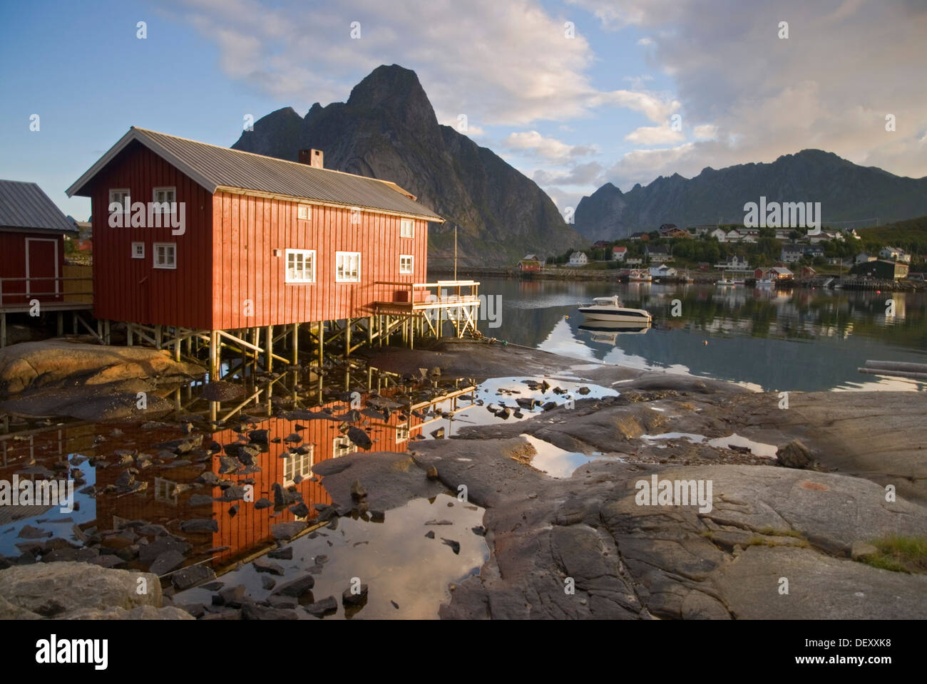A typical red rorbuer house, rorbu, at the coast of the Norwegian Sea ...