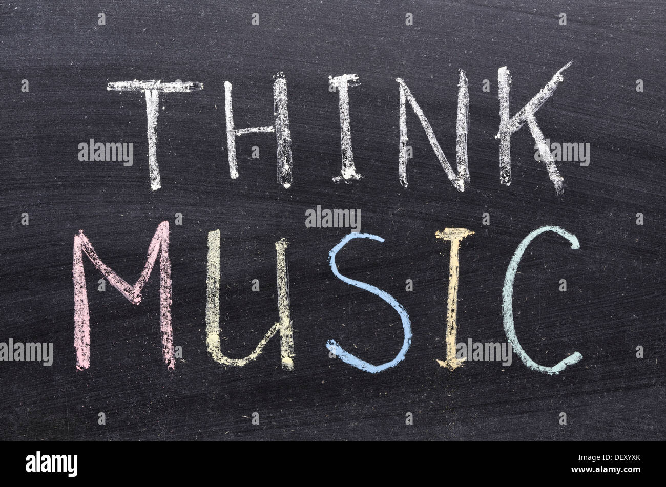 think music phrase handwritten on the school blackboard Stock Photo - Alamy