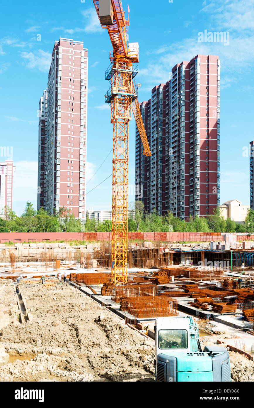 building under construction with workers Stock Photo - Alamy