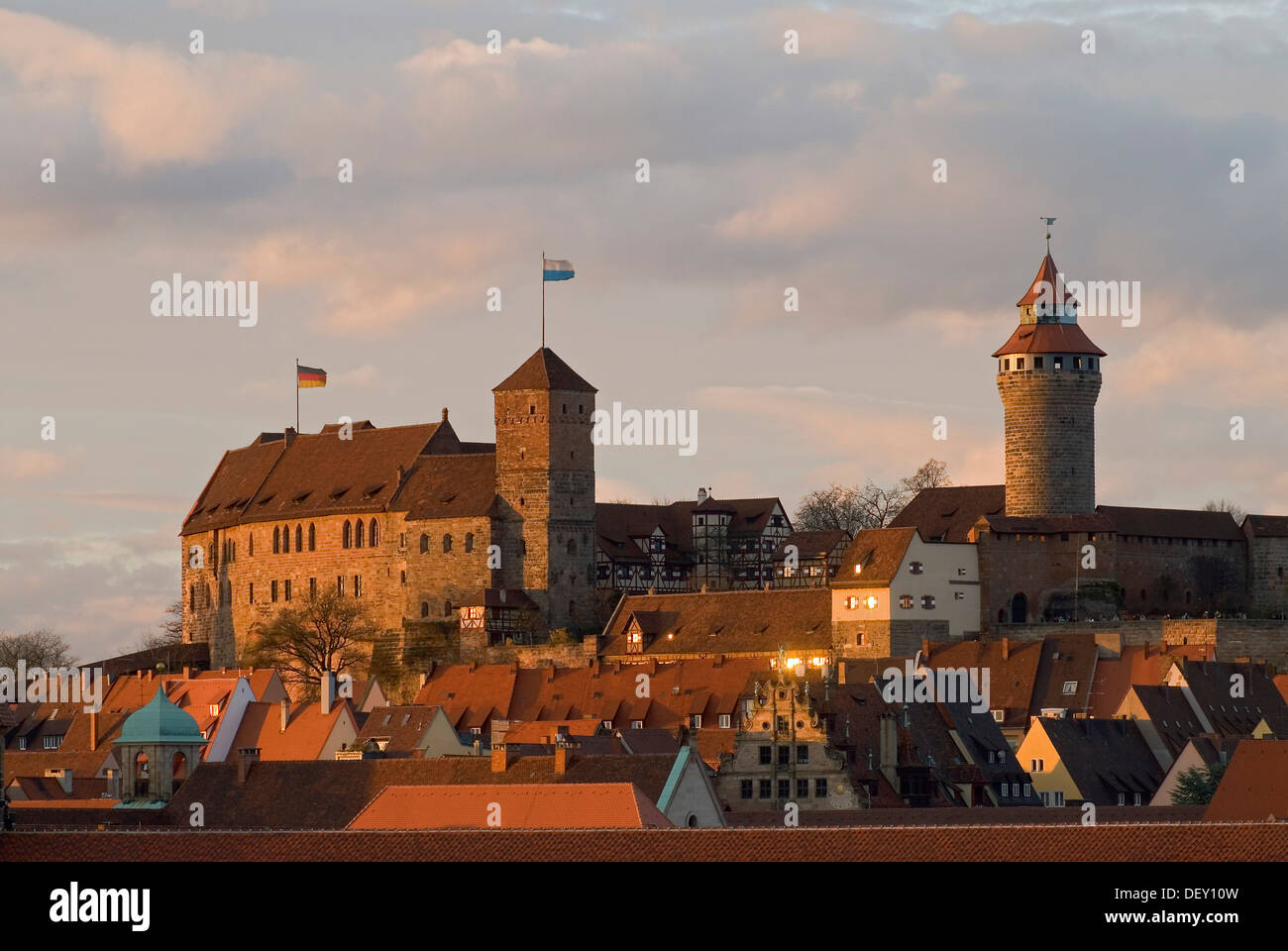 The Imperial Castle (Kaiserburg) of Nuremberg illuminated by warm ...