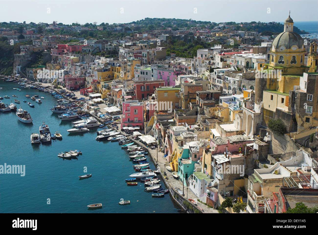The colorful houses of the fishing harbour of Procida island, Flegrean ...