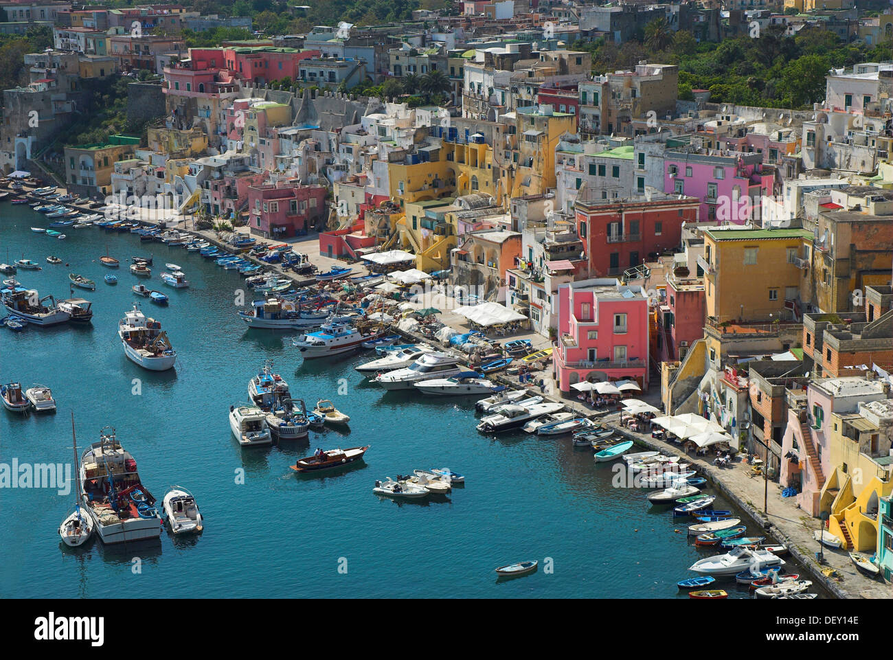 The colorful houses of the fishing harbour of Procida island, Flegrean ...
