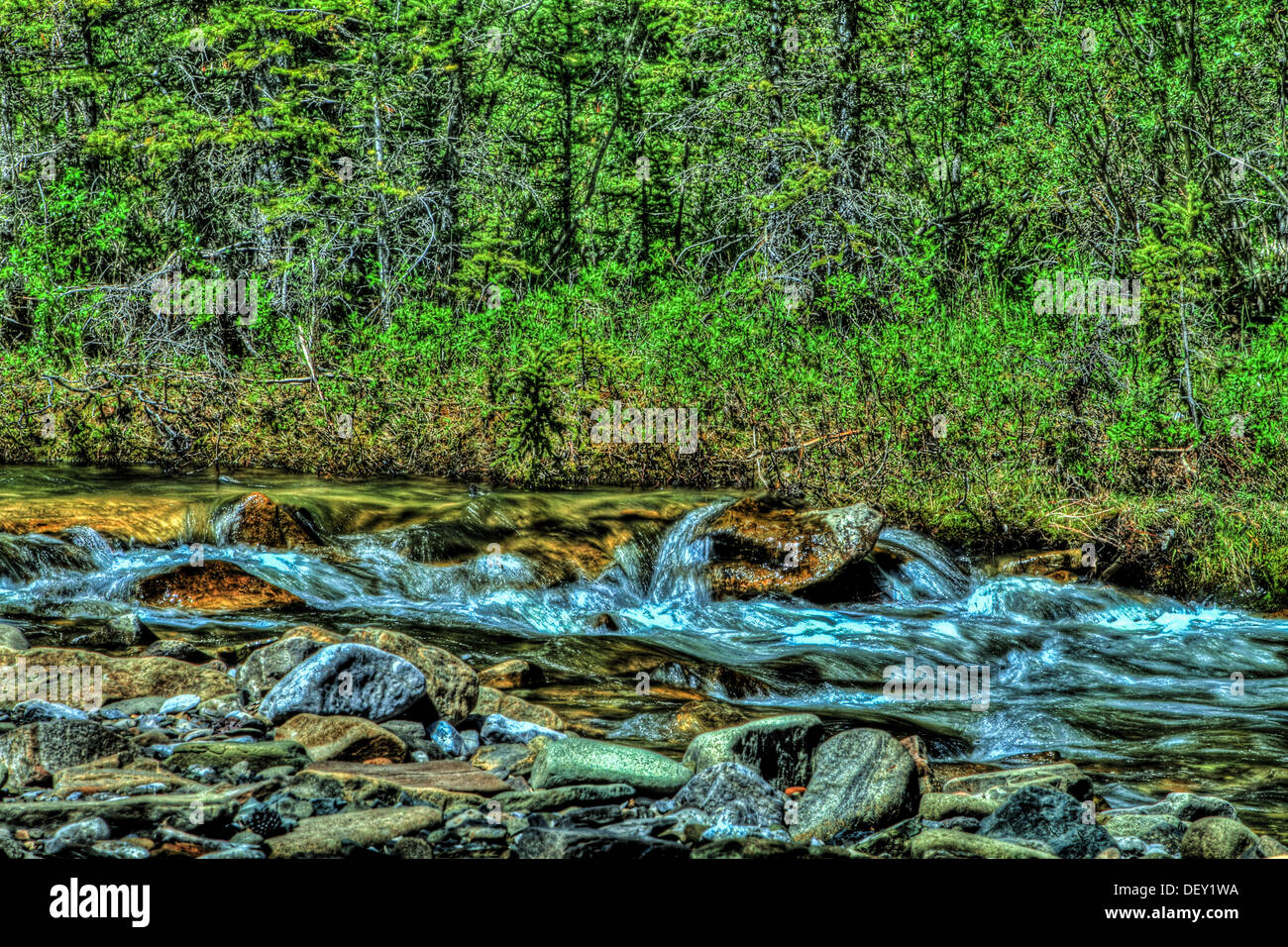 Amazing, wild landscape of river in motion with vivid, lush rich colors ...