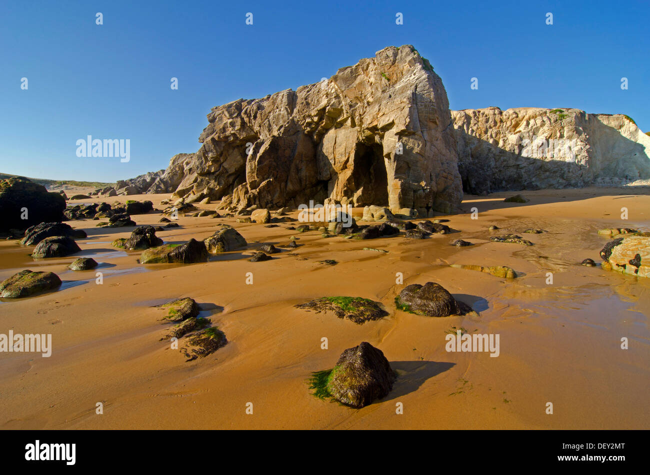 Cliffs and beach at the Côte Sauvage on the west side of the Quiberon ...