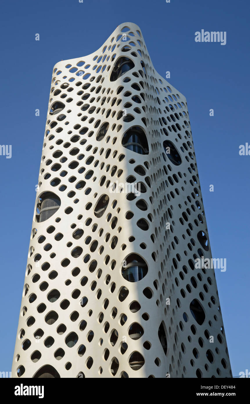 O-14 Tower, nicknamed Cheese Tower, against a blue sky, Business Bay ...