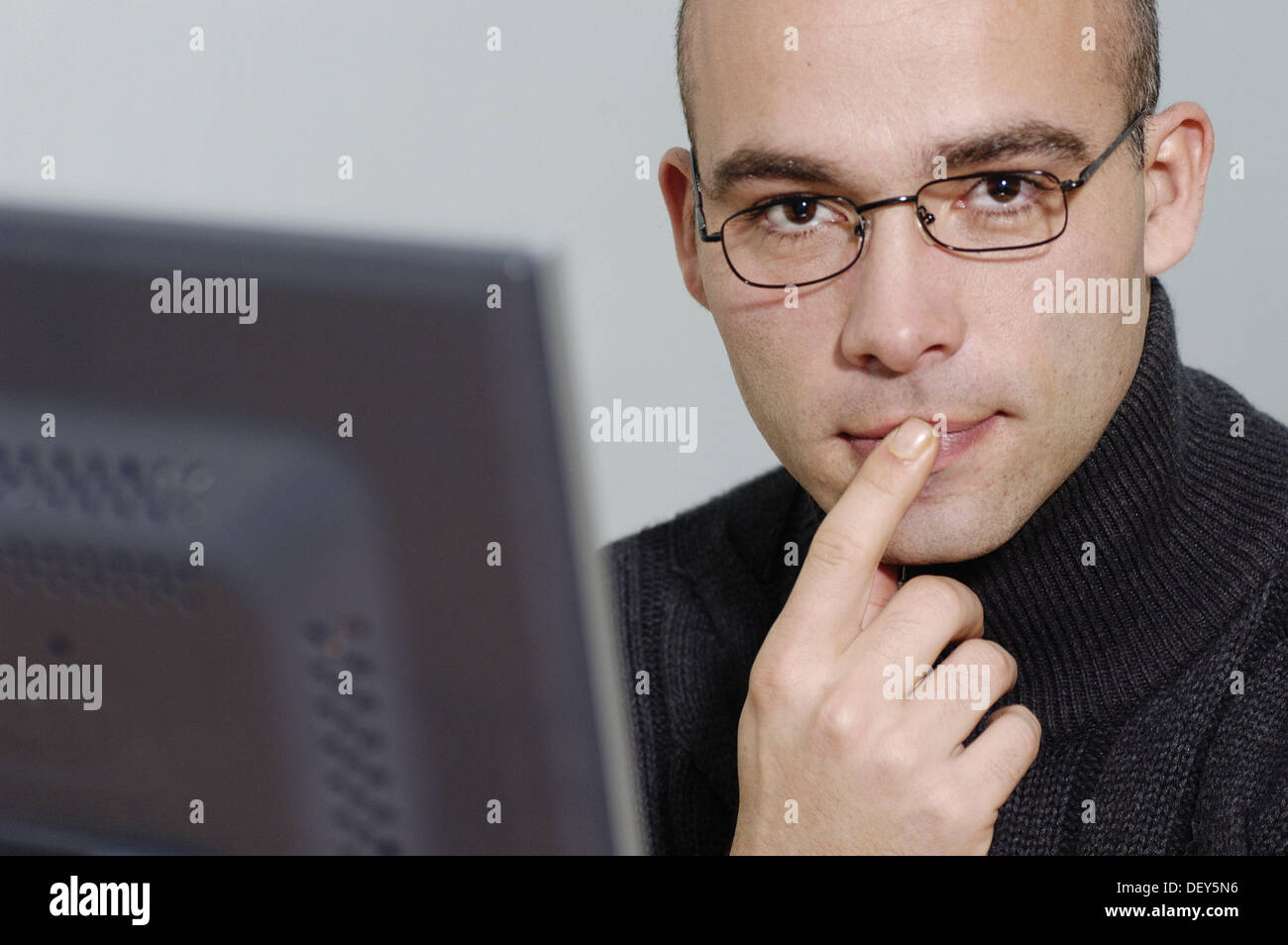 Bald man looking at the monitor hi-res stock photography and images - Alamy