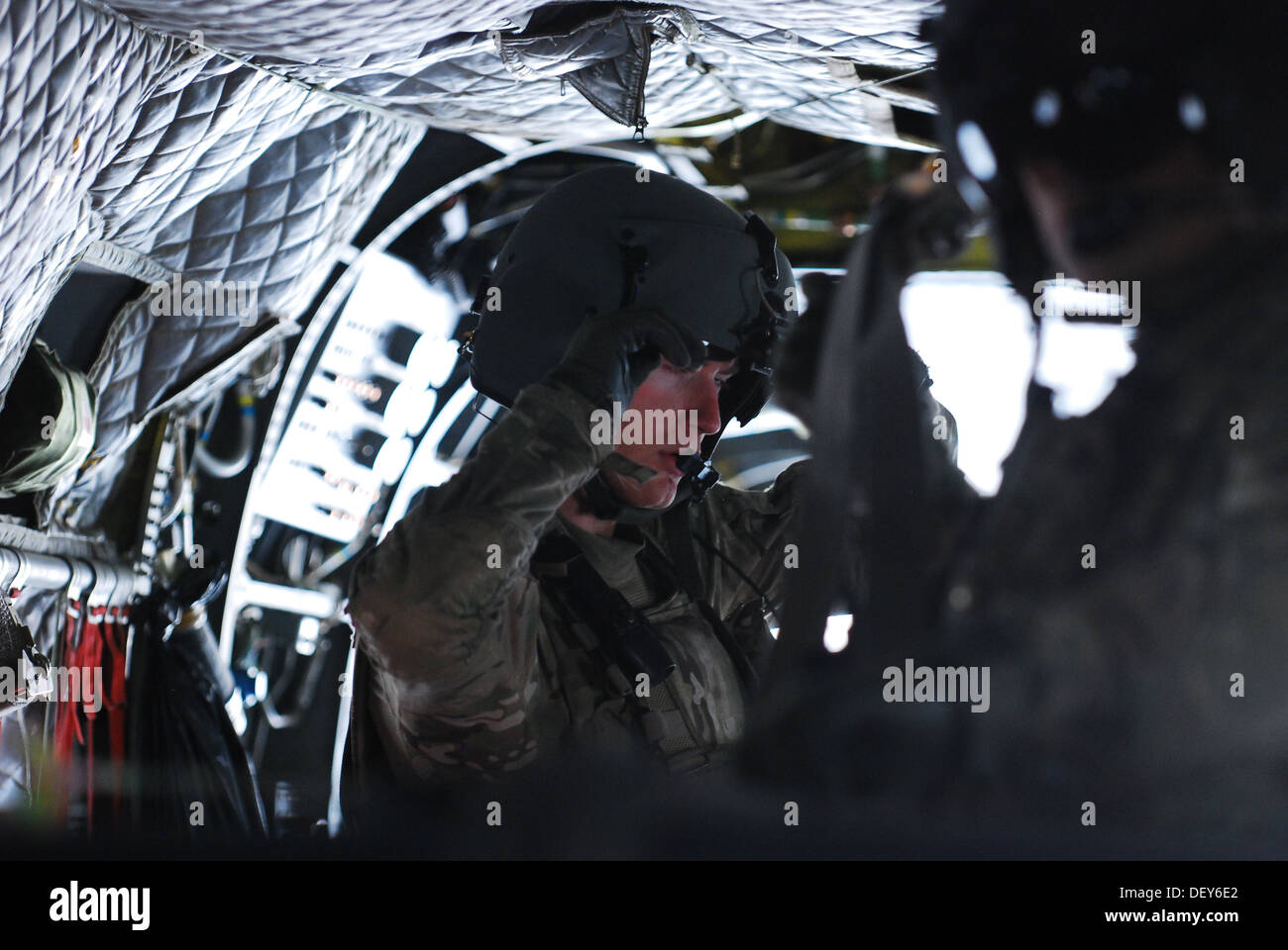 Pfc. Zach Fike, a CH-47 Chinook helicopter crew chief assigned to B ...