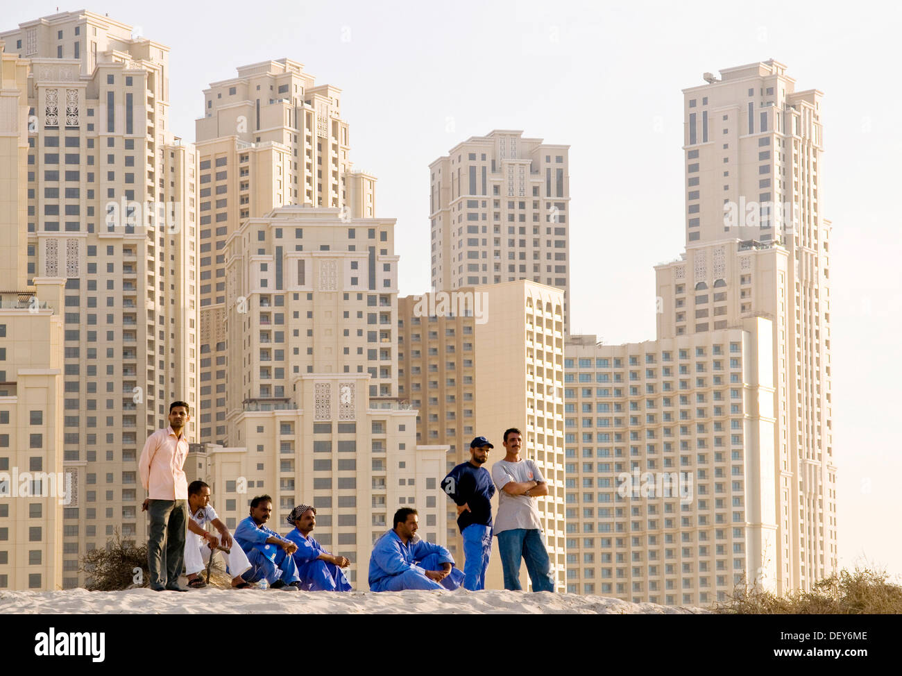 Skyline of Dubai Marina, construction workers, Dubai, United Arab ...