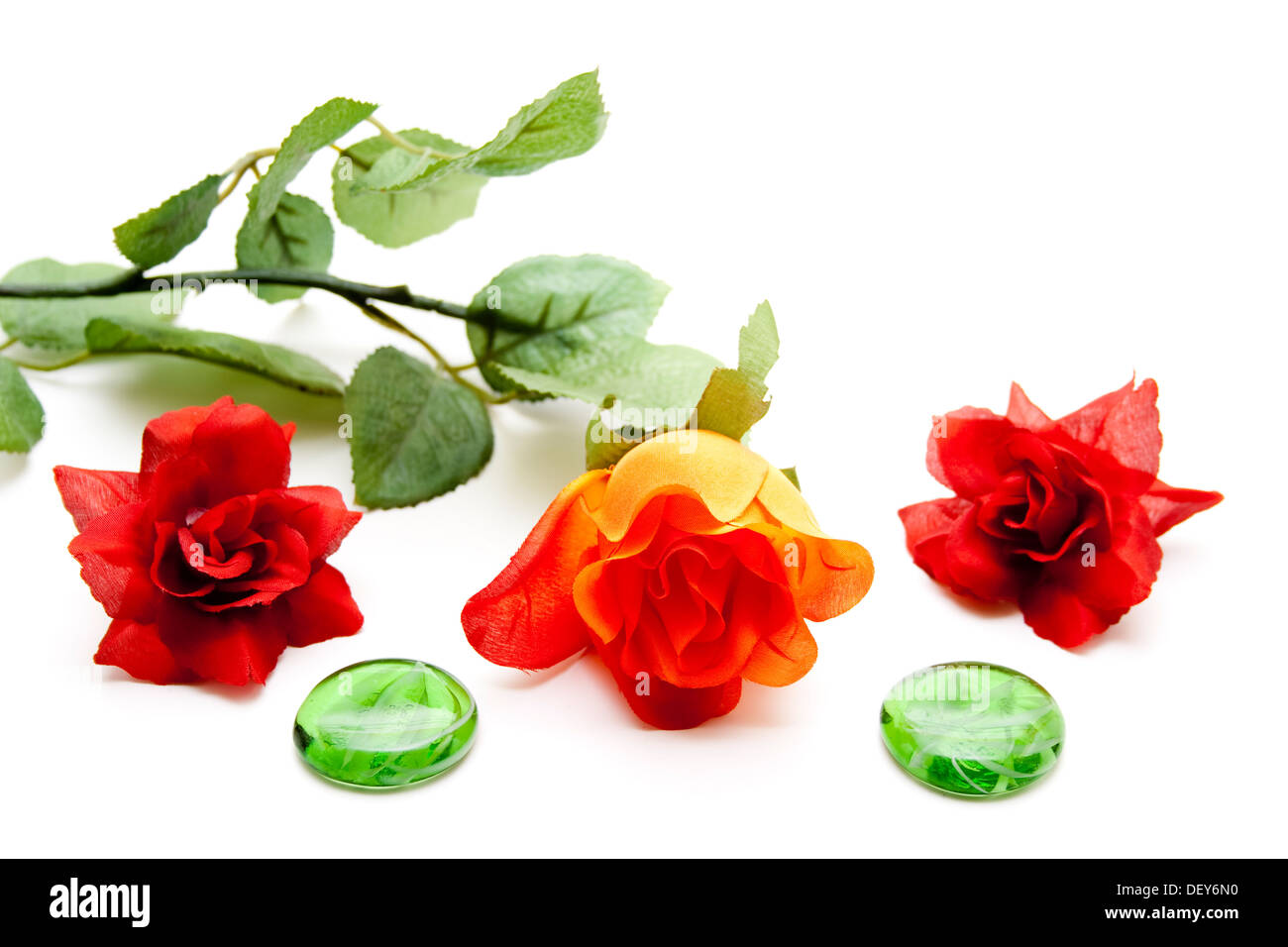 Glass stones with roses Stock Photo - Alamy