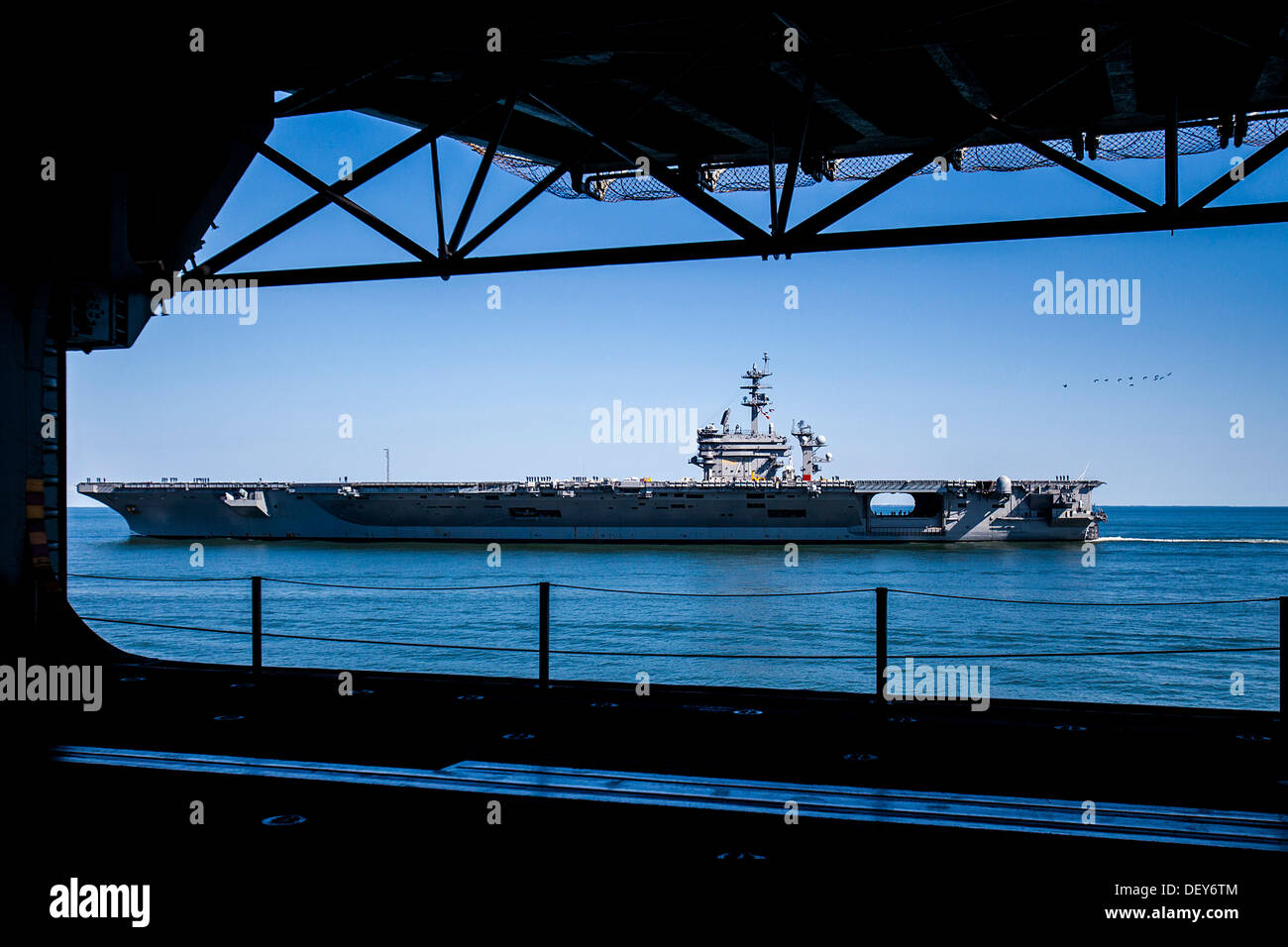The aircraft carrier USS Theodore Roosevelt (CVN 71) and amphibious assault ship USS Bataan (LHD ...