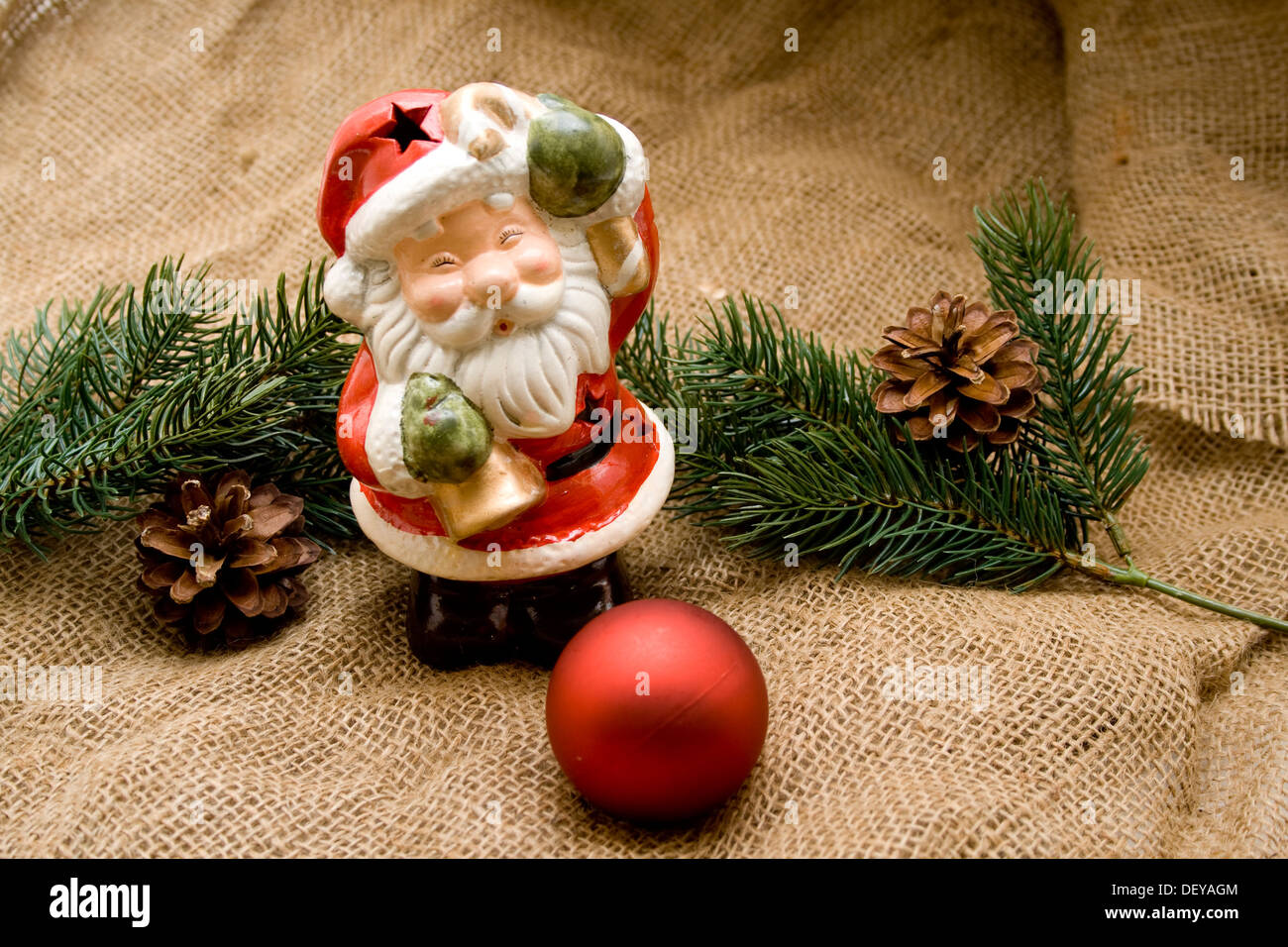 Santa Claus with Christmas ball Stock Photo - Alamy