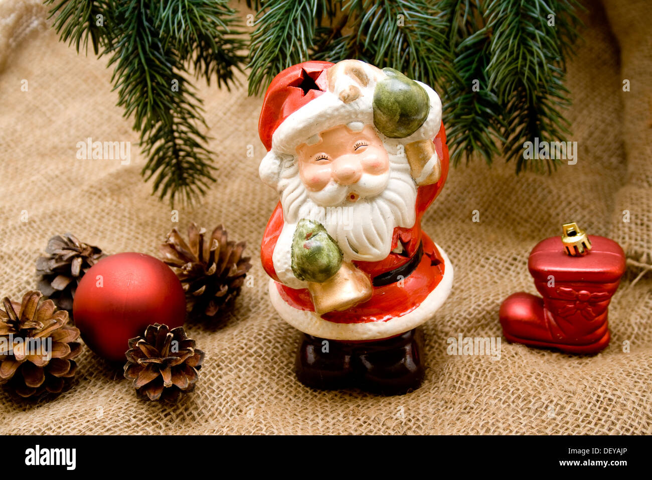 Santa Claus with Christmas ball Stock Photo - Alamy