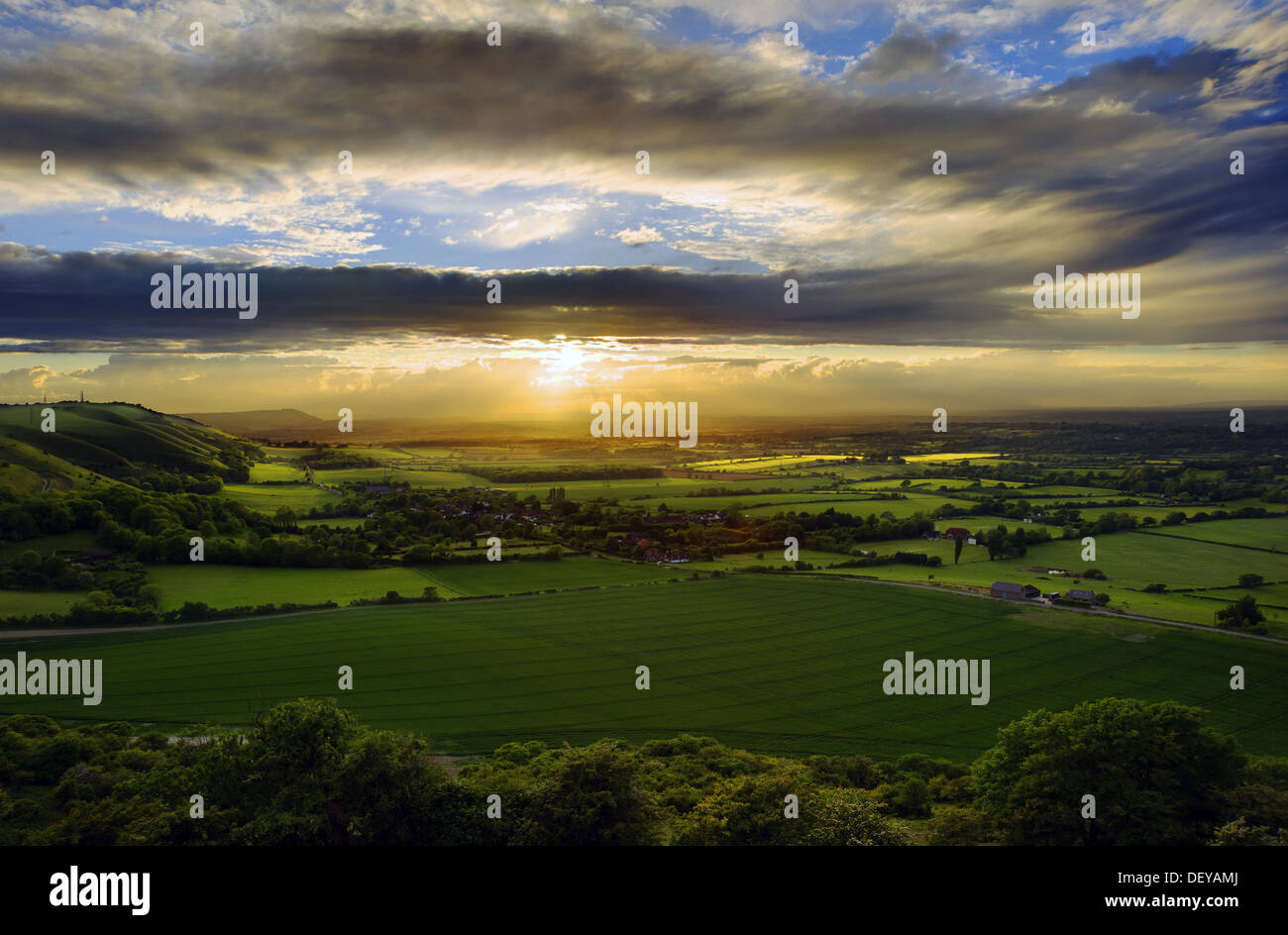 Beautiful Summer sunset landscape over English countryside escarpment ...