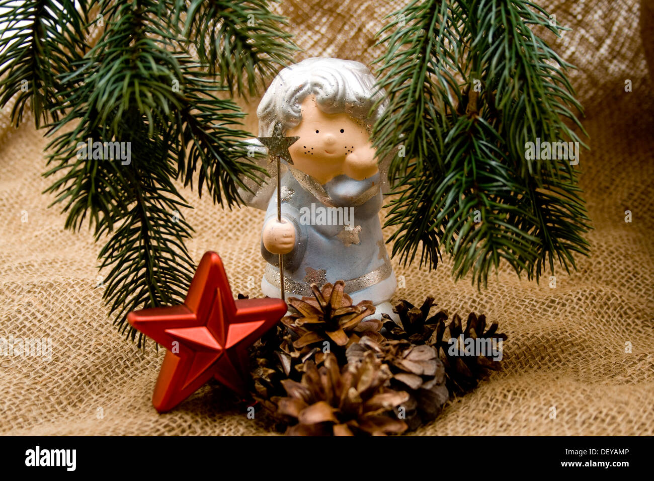 Christmas angel with Christmas star Stock Photo - Alamy