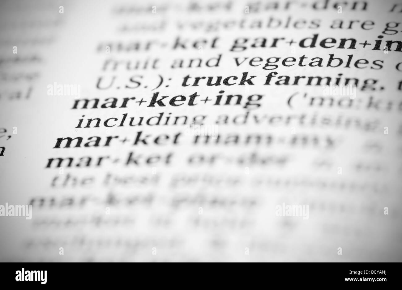 Macro image of dictionary definition of word marketing Stock Photo - Alamy