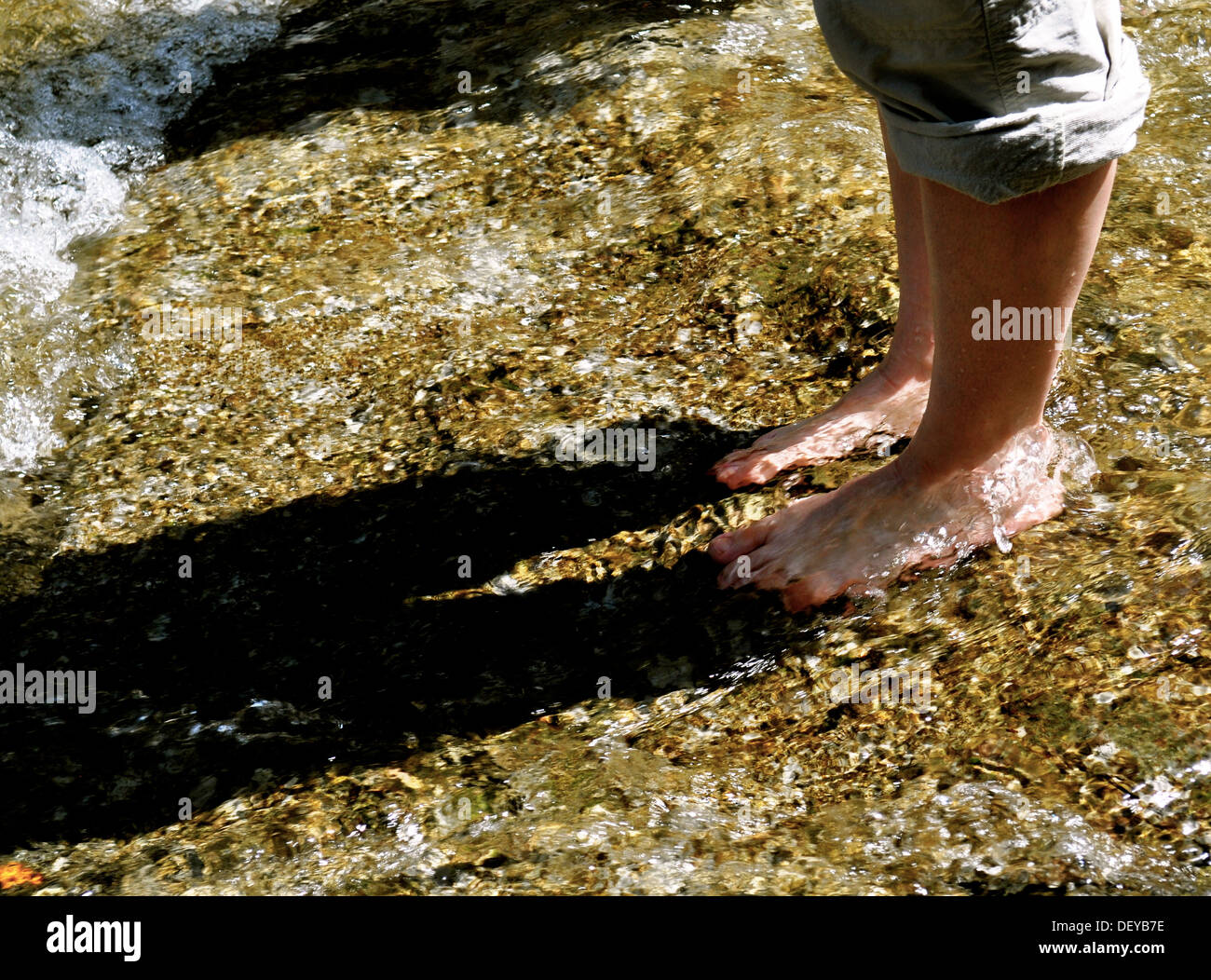 Toes in the water Stock Photo - Alamy