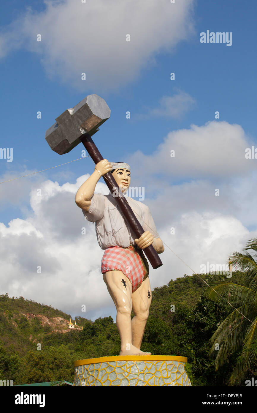 A statue at Win Sein Taw Ya, the 560 foot reclining buddha at Yadana ...
