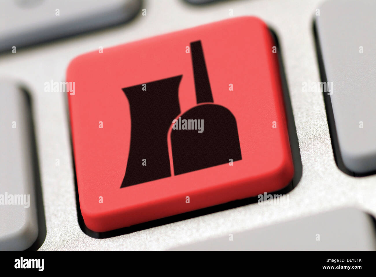 Pictogram of a nuclear power plant on red button of a computer keyboard ...