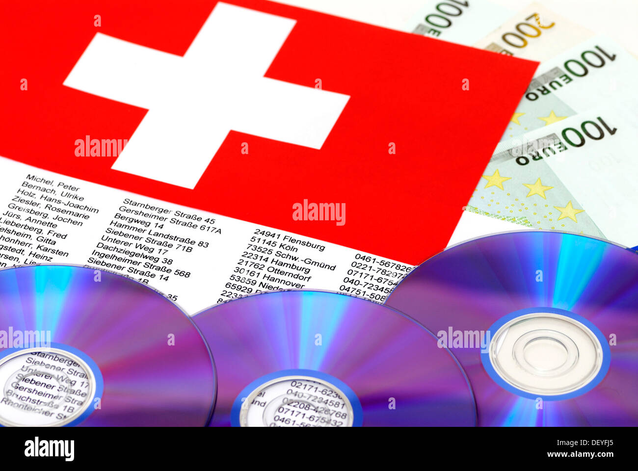 Swiss flag, address list, and data CD, symbolic image sale of Swiss ...