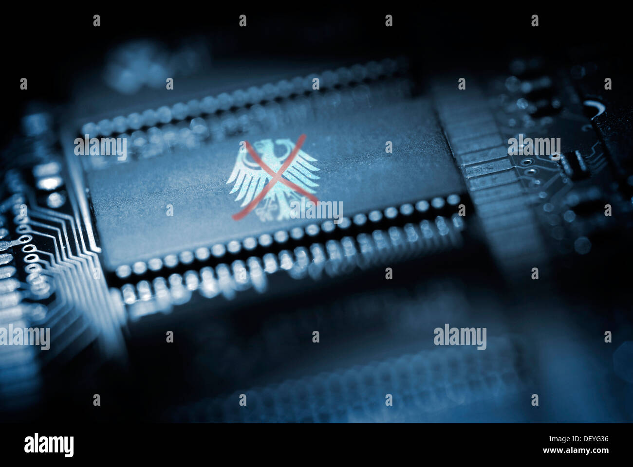 Computer board with crossed-out federal eagle, symbolic image for data ...